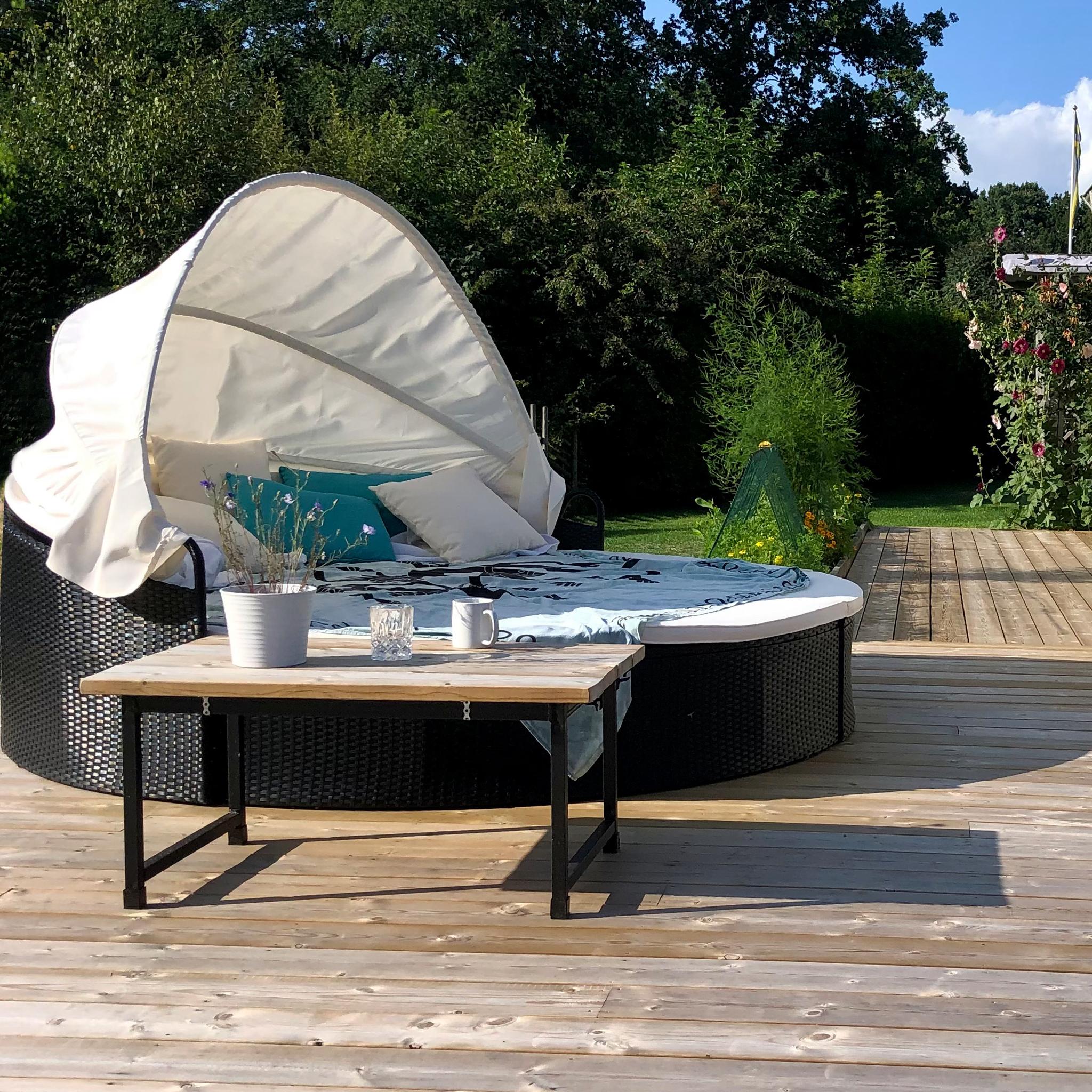 Rund solseng i kunstrotting med innebygd oppbevaring - Lyfco Höllviken